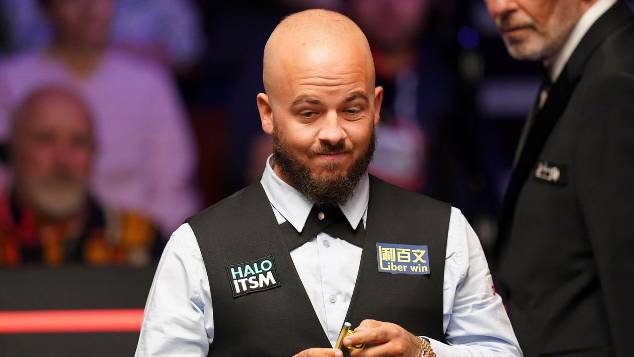 Luca Brecel into last 16 at the Crucible after beating Ryan Day 10-7