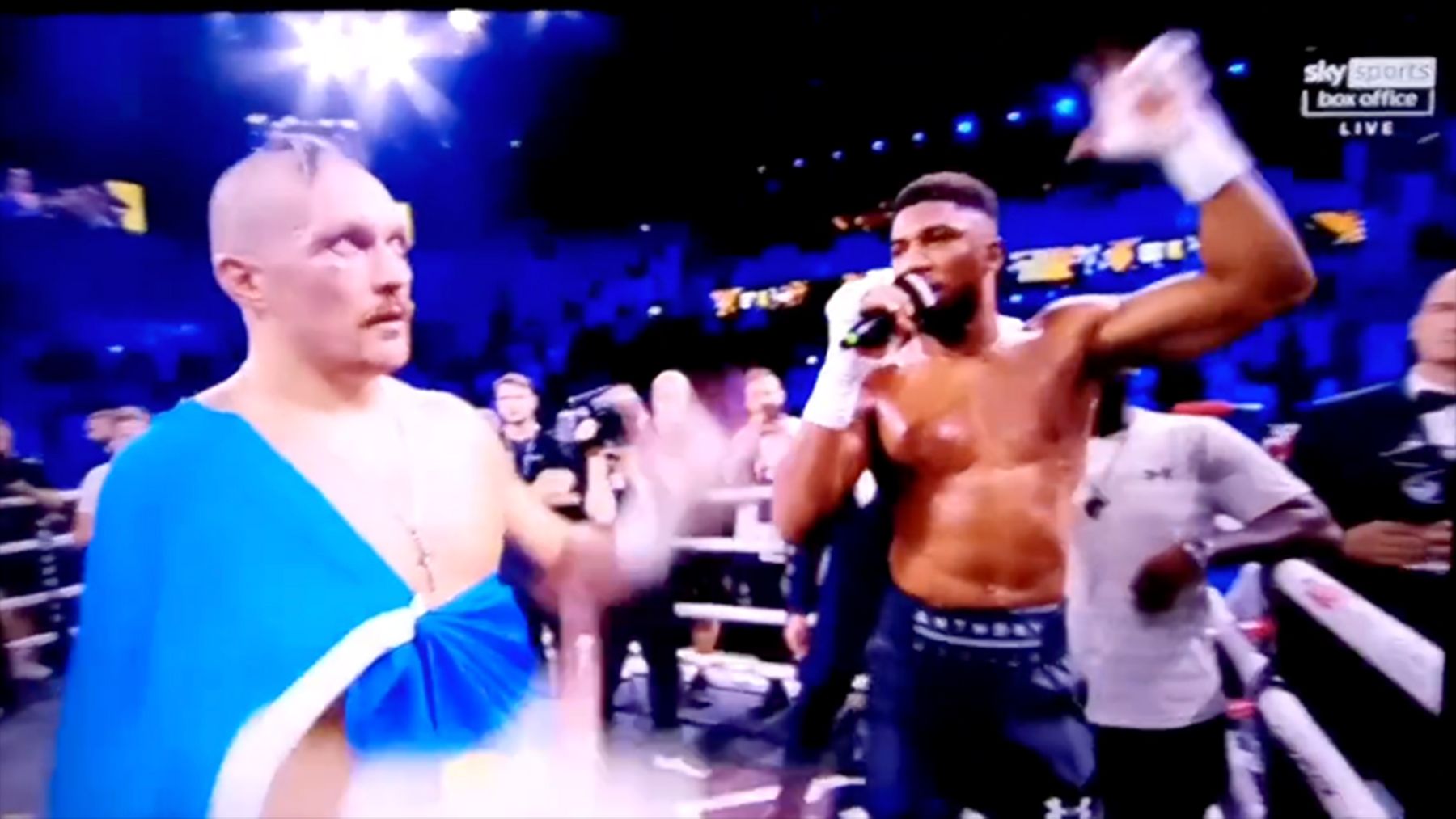Watch Anthony Joshua throw belts out of ring and praise Oleksandr Usyk in bizarre post-fight ...